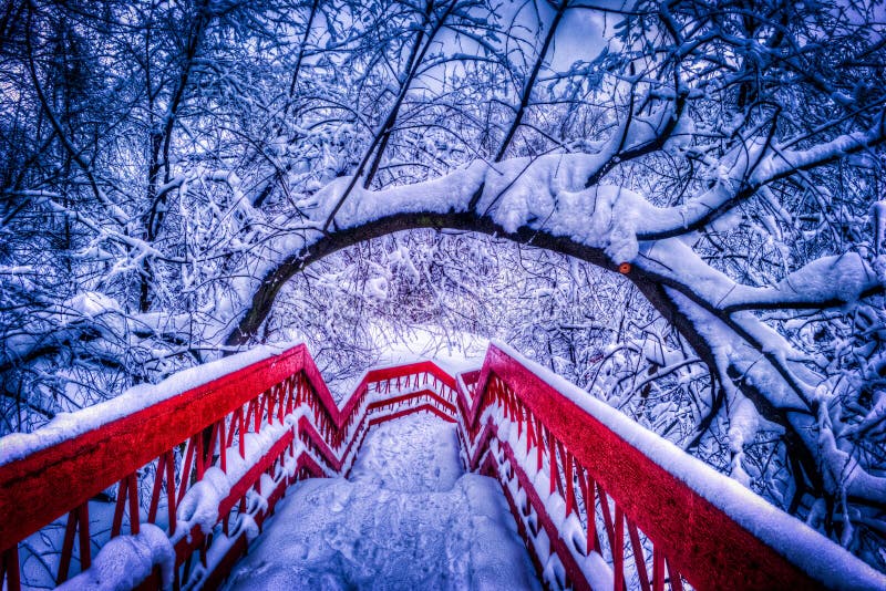 Japanese Red Bridge with Snow in the Pond during Winter Stock Image ...