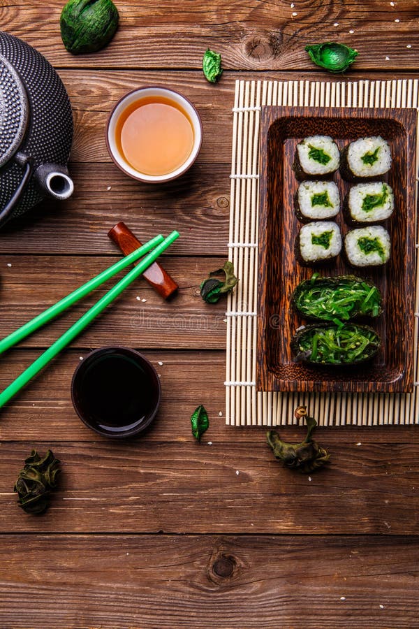 Japanese Rolls, Sticks, Teapot, Tea Stock Photo - Image of japan, green ...