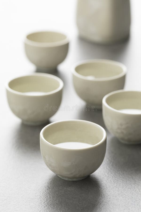 Japanese cups with sake stock image. Image of rice, traditional - 116469521