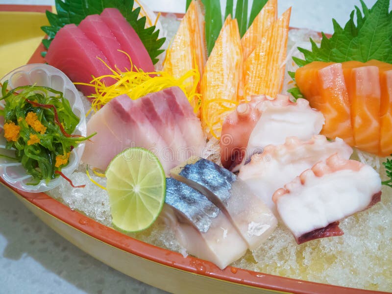 Japanese Sashimi Set on Boat Plate Stock Photo - Image of orange, squid ...
