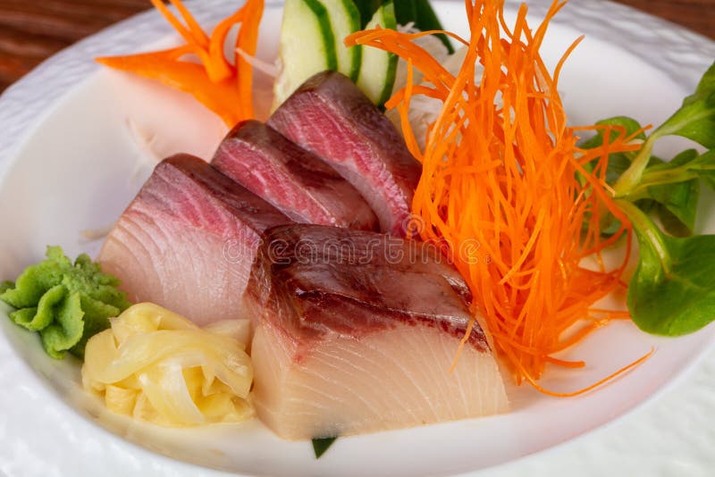 Sashimi of the yellowtail stock photo. Image of orange - 214269470