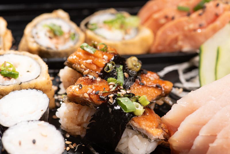 Japanese seafood sushi set stock photo. Image of black - 258058374