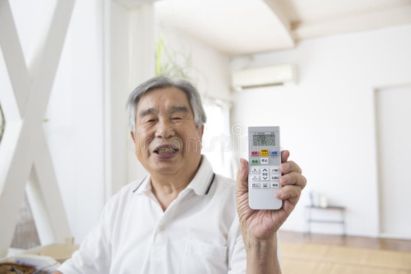 Elderly People Using Air Conditioner Stock Image - Image of appliance ...