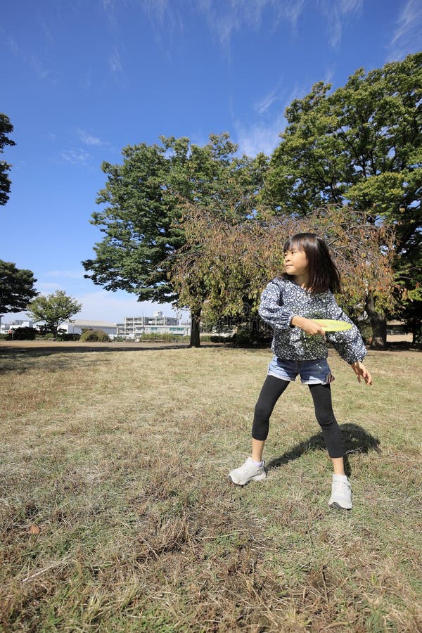 Japanese Student Girl Playing Flying Disc Stock Photo - Image of disc ...