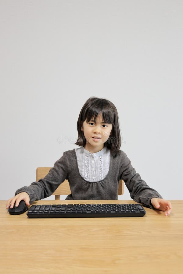 Japanese Student Girl Using PC Mouse Stock Photo - Image of computer ...