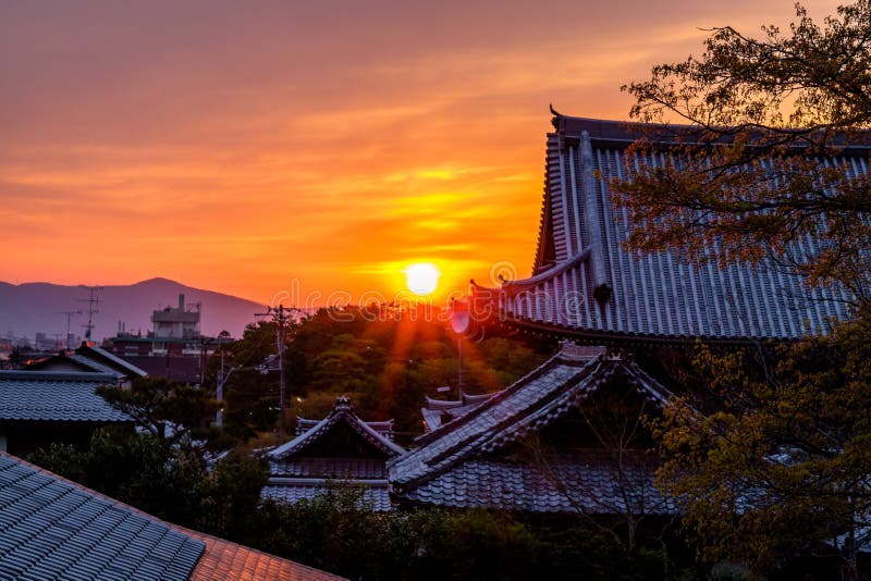 Japanese sunset over ocean stock photo. Image of water - 104678596