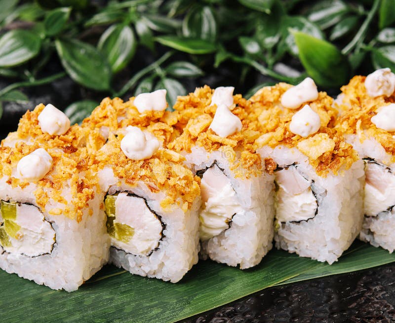 Japanese Sushi Roll on Black Slate Stone Plate Stock Photo - Image of ...