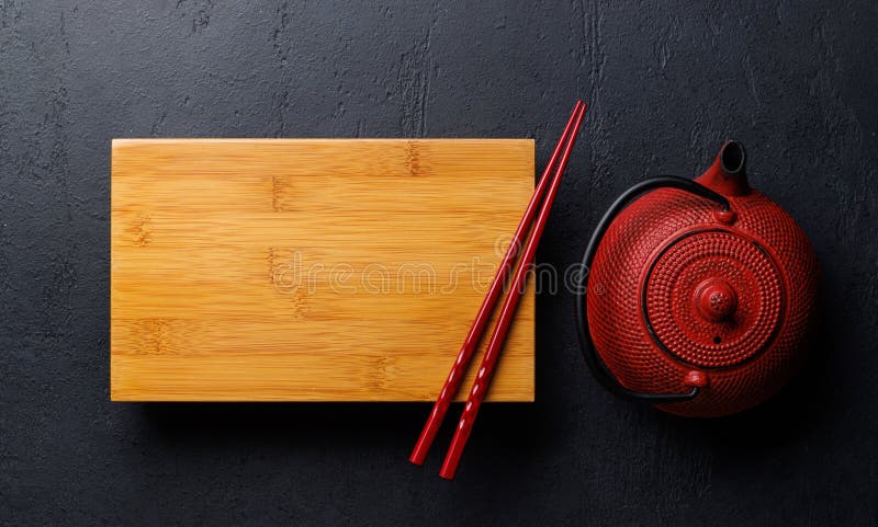 Japanese Table Setting with Wooden Board, Teapot, Chopsticks Stock ...