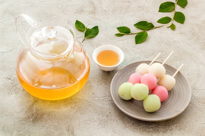 Japanese Tea and Sweet Dumplings Dango on Plate, Close Up Stock Photo ...