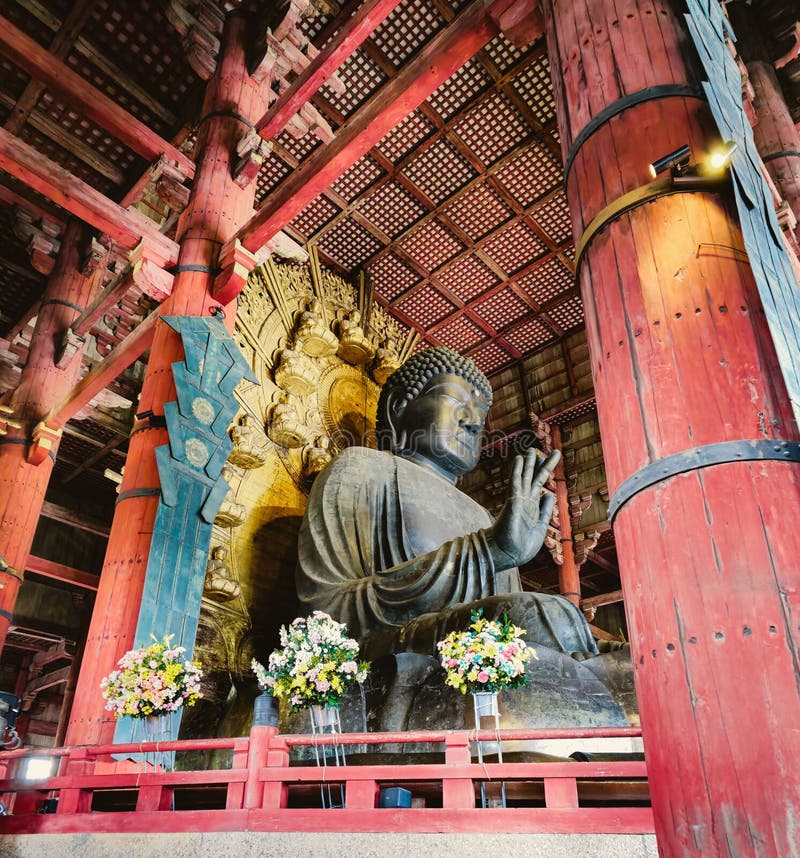 A Japanese Temple with a Statue for Prayers Stock Photo - Image of ...