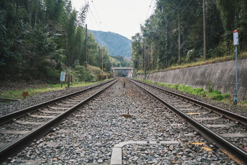 Japanese Train Tracks Besides a Freeway Stock Photo - Image of mountain ...