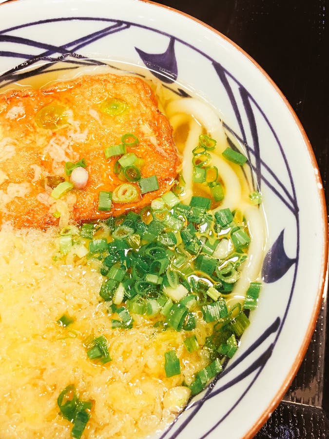 Udon Noodle in Japanese Style with Tempura, Pork, Fish Paste, Egg and ...