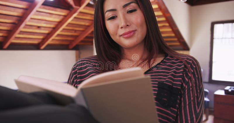 Japanese Woman Reading a Book at Home Stock Video - Video of leisure ...
