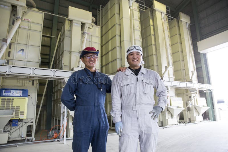 Workers Working in Rice Mill Stock Image - Image of male, machine ...