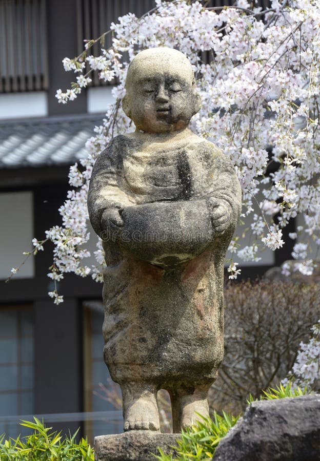 Figure in Stone of Japan stock image. Image of faith - 317783597
