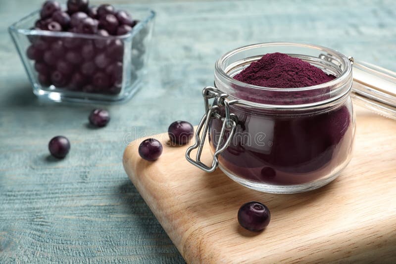 Jar with Acai Powder on Table Stock Photo - Image of detox, blue: 123236946