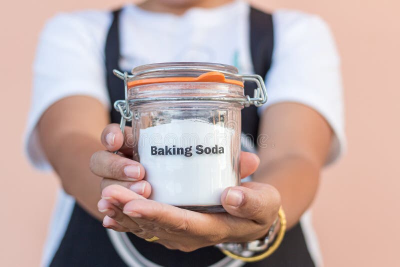 Jar of Baking Soda in Woman Hand.cleaning Concept Stock Photo - Image ...