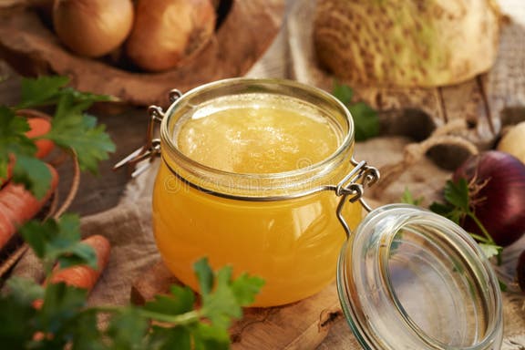 A Jar of Bone Broth with Fresh Vegetables Stock Photo - Image of ...