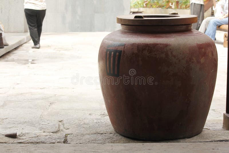 The Old Water Jar is Located on the Ground. Stock Photo - Image of ...