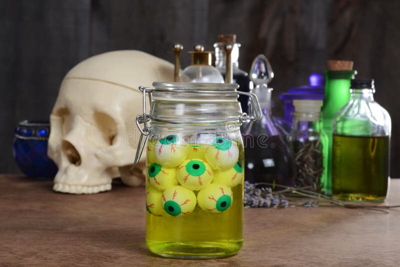 Jar of Eyeballs Skull and Potions Stock Image - Image of liquid ...