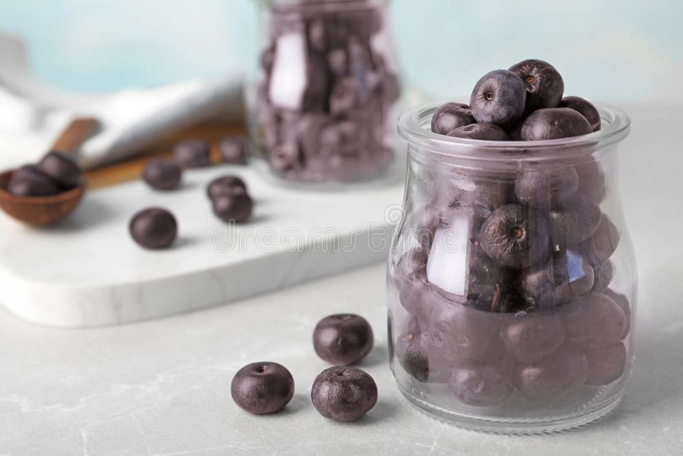 Jar of Fresh Acai Berries on Stone Table, Closeup Stock Photo - Image ...