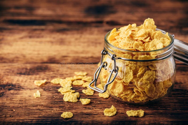 Jar full of corn flakes stock image. Image of yellow - 351982789