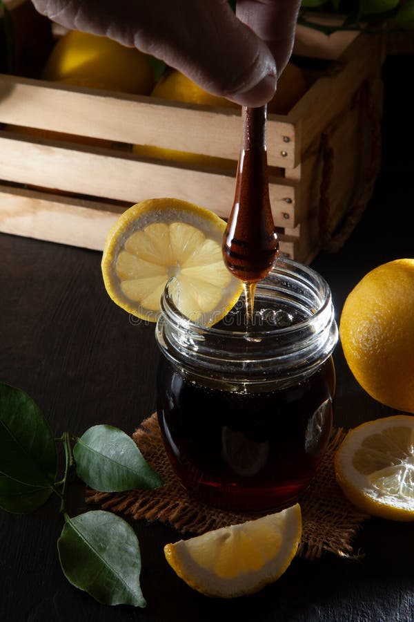 Jar of Honey and Cut Lemon, Vertical Stock Photo - Image of organic ...