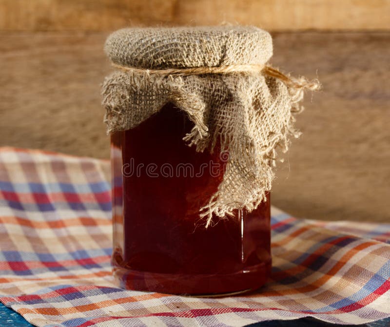 Jar of Jam on a Background of a Wooden Wall. Stock Photo - Image of ...