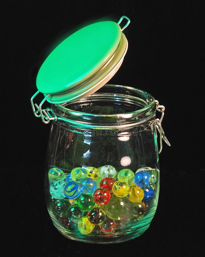 Marbles in Glass Jar stock image. Image of cutout, still - 5958761