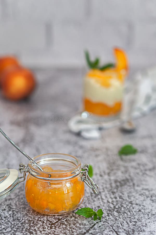 Jar of Peach Jam on White Brick Wall Background Stock Photo - Image of ...