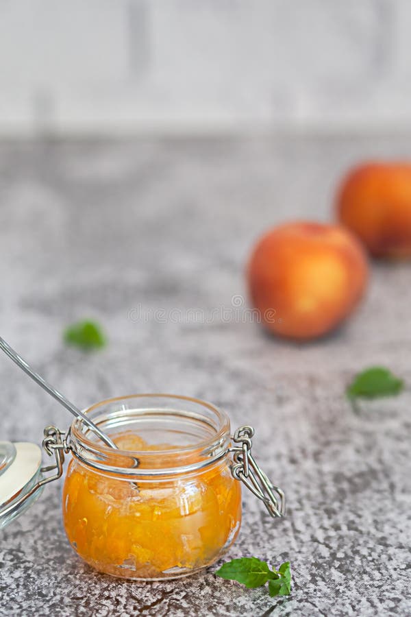 Jar of Peach Jam on White Brick Wall Background Stock Image - Image of ...