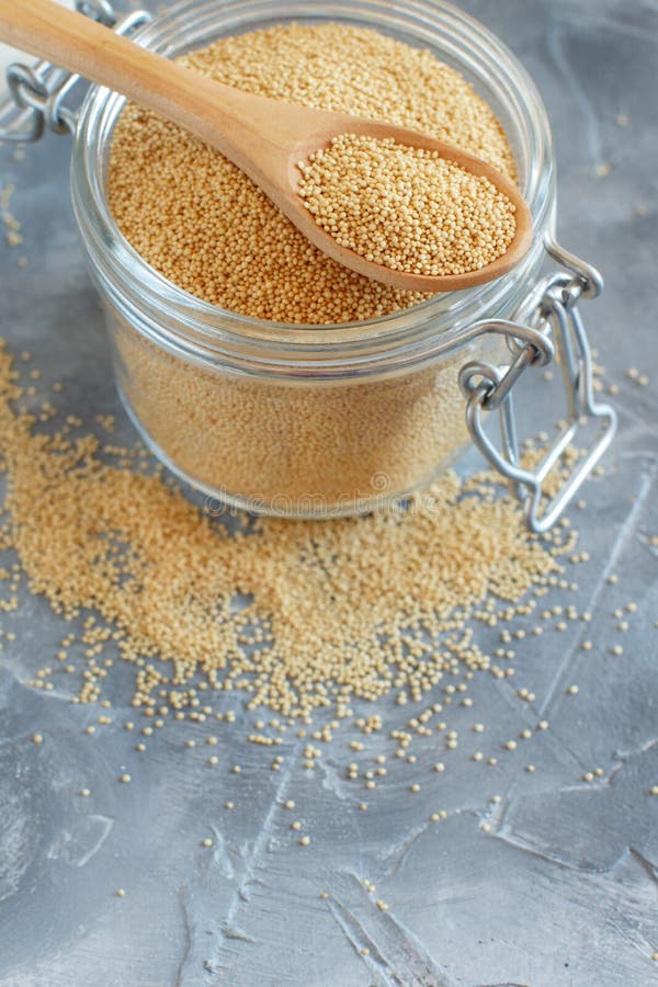 Jar of Raw Amaranth Grain with a Spoon Stock Photo - Image of grey ...