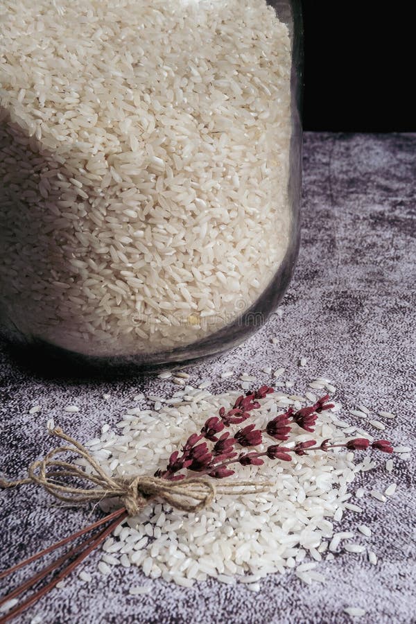 Jar of rice with flowers stock photo. Image of snack - 231738804