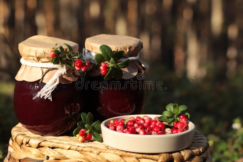 Jars of Delicious Lingonberry Jam and Red Berries on Wicker Basket ...