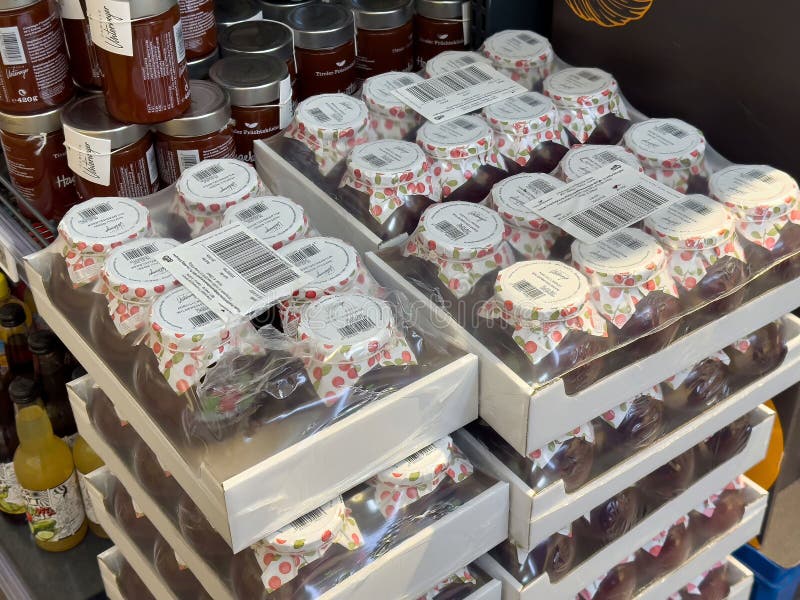 Jars of Fruit Jam in Store Display with Decorative Lids Editorial Photo ...