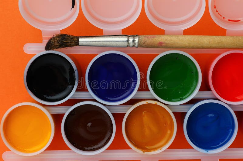 Jars of Gouache on an Orange Background. Set for the Development of ...