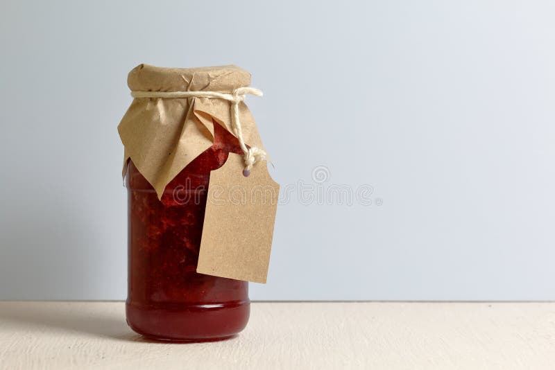 Jars of Jam, Covered with Paper and Tied with Twine. on the String Hang ...