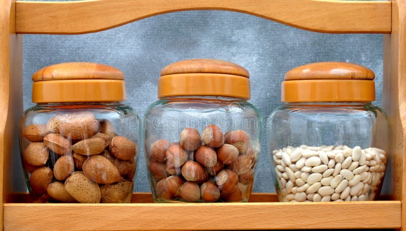 Jars with Nuts on the Shelf Stock Photo - Image of healthy, fresh: 90817104