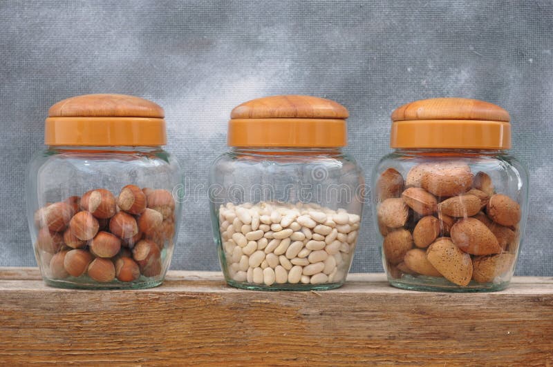 Jars with Nuts on the Shelf Stock Image - Image of healthy, snack: 90817299