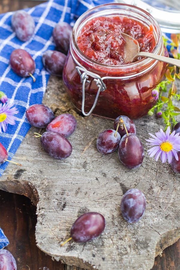 Jars plum jam wooden table stock photo. Image of marmalade - 61894734