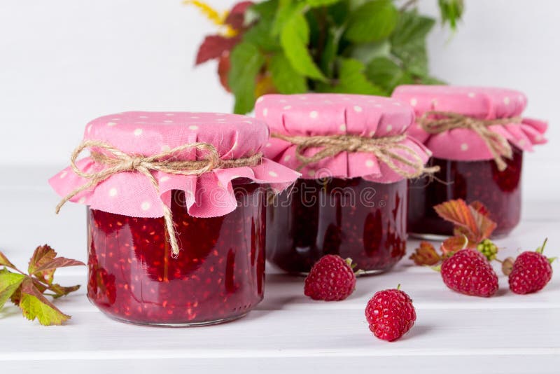 Jars with Raspberry Jam Placed in Rows and Fresh Raspberry Stock Image ...