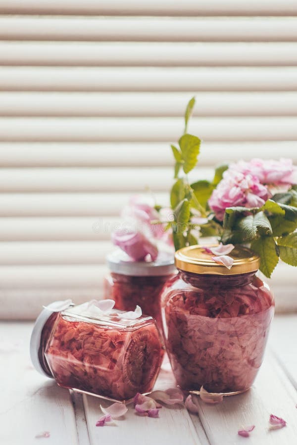 Jars of the Rose Jam and Flower Bouquet on the Window Light Background ...