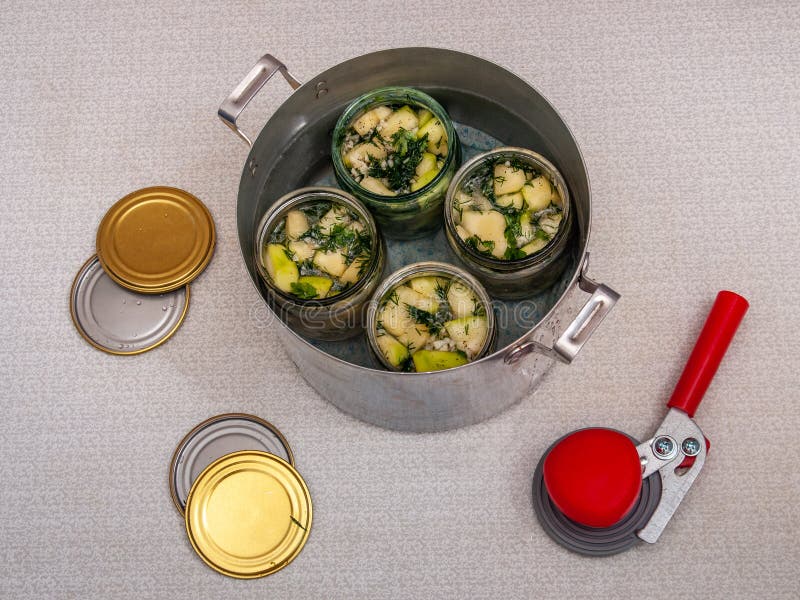 Jars of Vegetables in a Large Aluminum Pan. Pasteurization of Canned ...