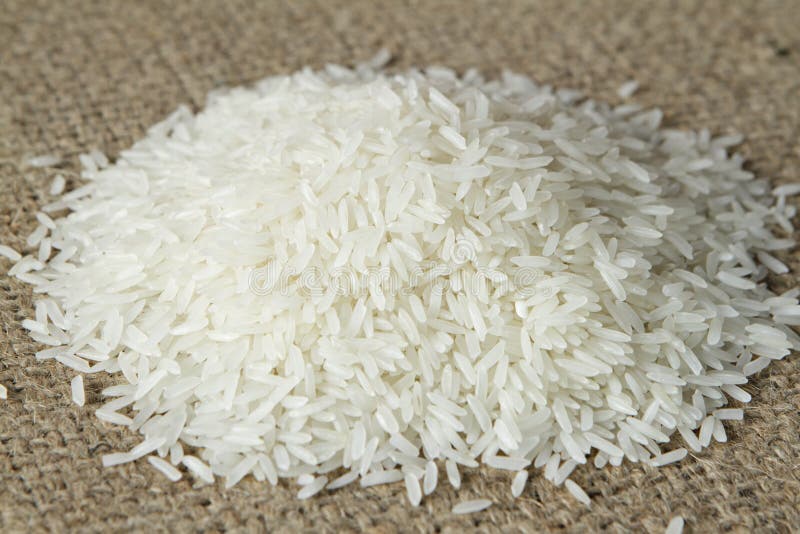 Jasmine rice stock image. Image of scoop, cereal, food - 55542537