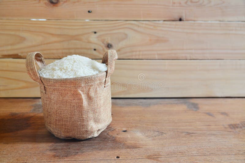 Jasmine rice in sack stock photo. Image of bowl, jasmine - 96074736