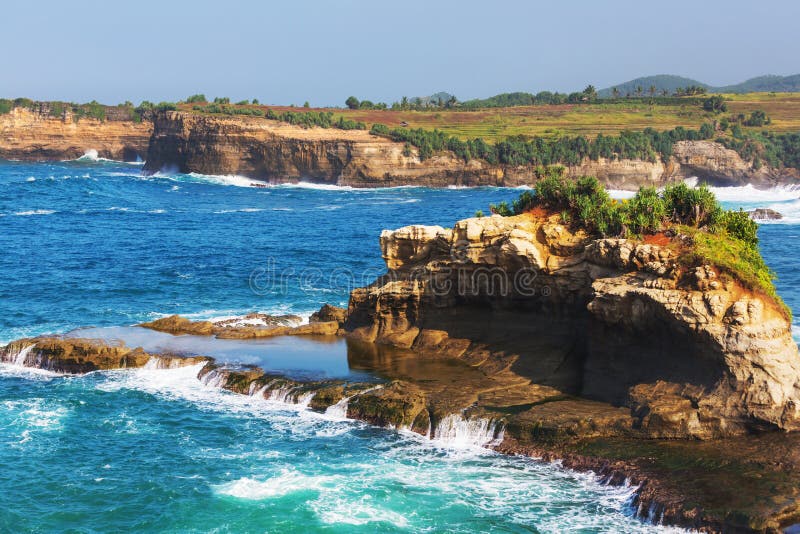 Java beach stock photo. Image of cliff, sunlight, scenics - 54175728