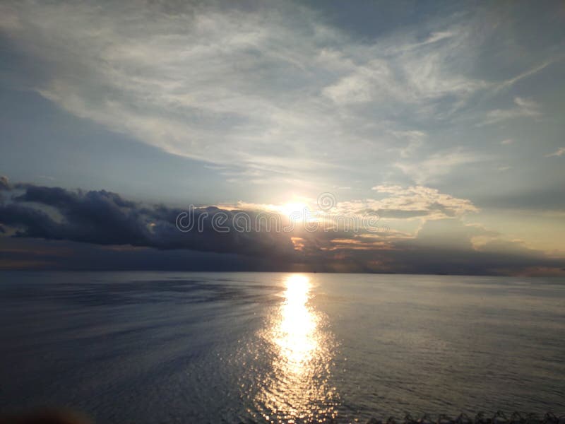 Sunset in the Offshore Area, FPSO and Other Vessels Together in an ...