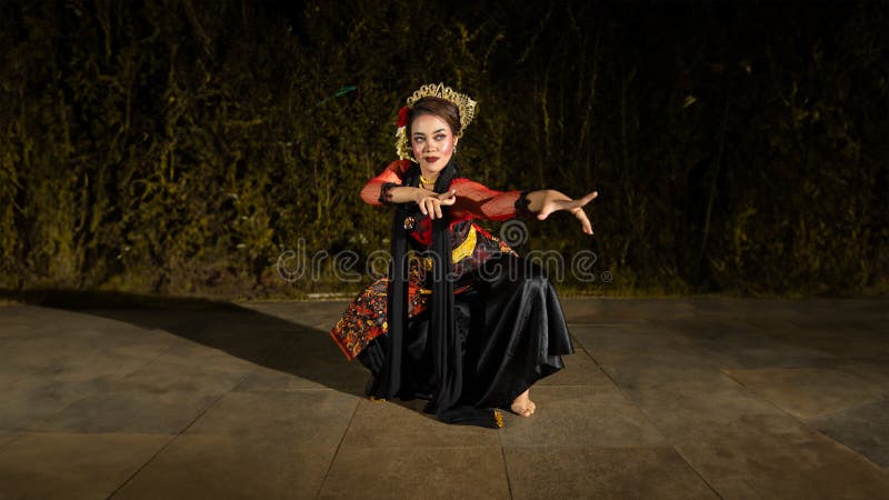 A Javanese Dancer in a Red Costume Presented a Dance that Captivated ...