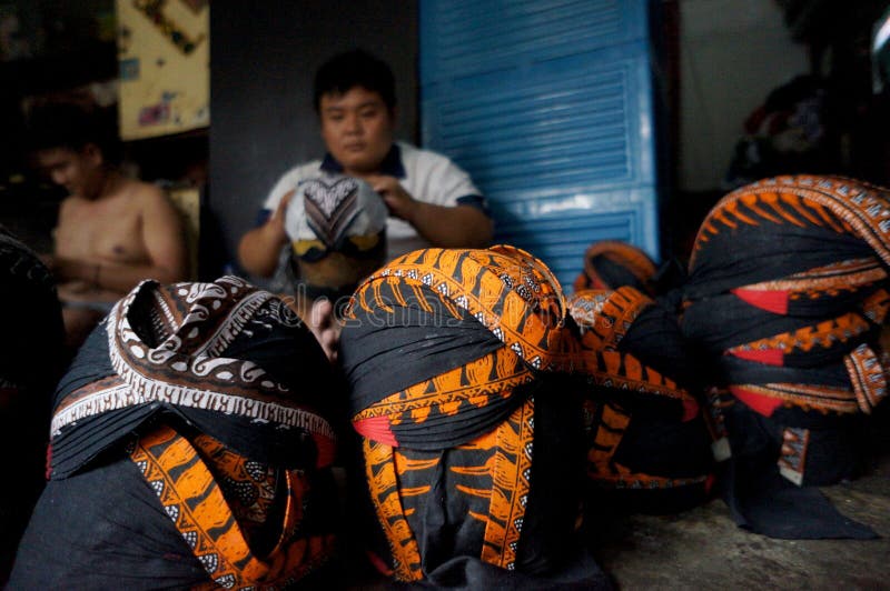 A Man Making Javanese Traditonal Hat Made from Batik Fabric. Editorial ...