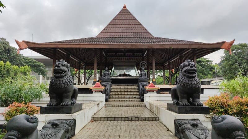 Javanese Joglo House with Lion Guardian Stock Photo - Image of entrance ...